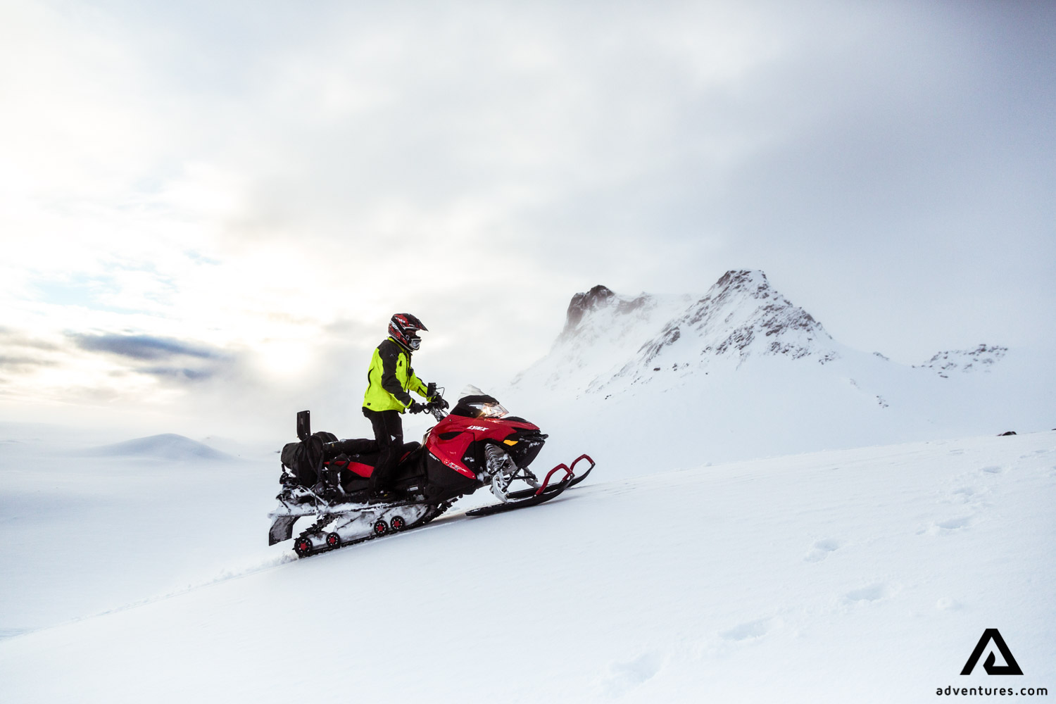 Snowmobiling & Man-Made Ice Tunnel | Adventures.com